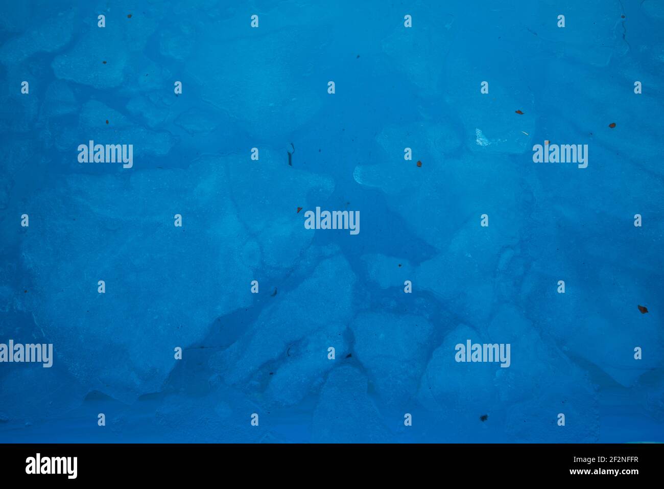 Ice texture on the pool in the winter Stock Photo - Alamy
