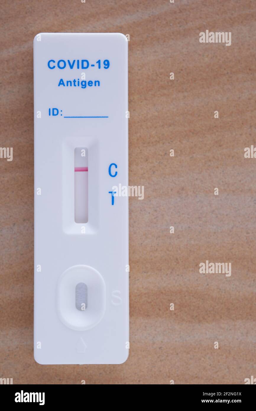 Corona antigen rapid test cassette with negative test result. Plastic ...