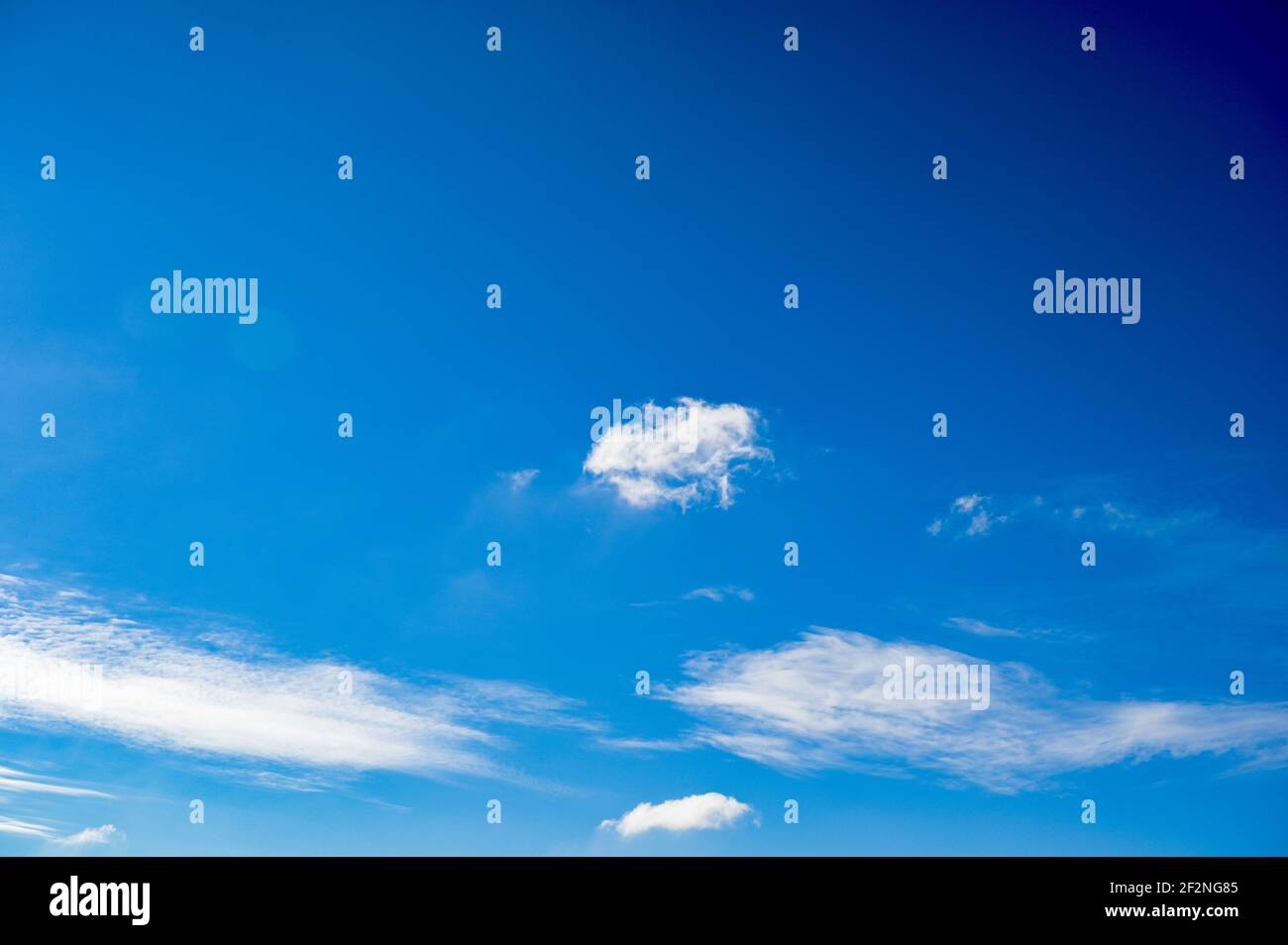 Blue sky with few clouds Stock Photo - Alamy