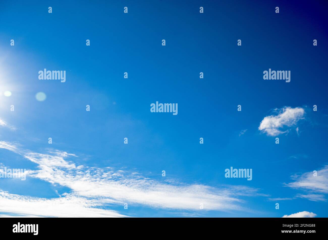 Blue sky with few clouds Stock Photo - Alamy