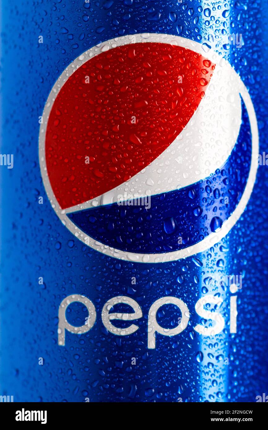 Detail of classic Pepsi can with water droplets on black background ...
