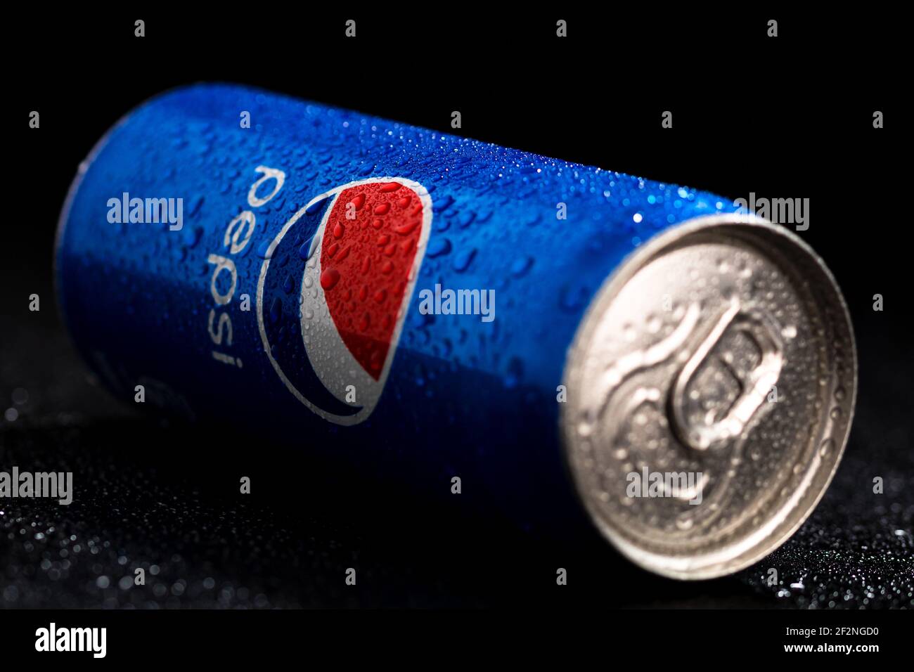 Editorial photo of Pepsi can with water droplets on black background ...