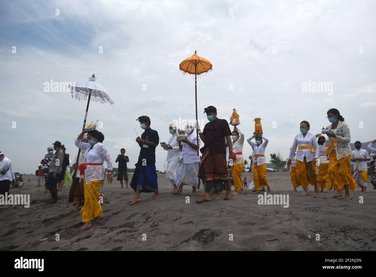 People in Yogyakarta carry out the Melasti ceremony, adhering to ...
