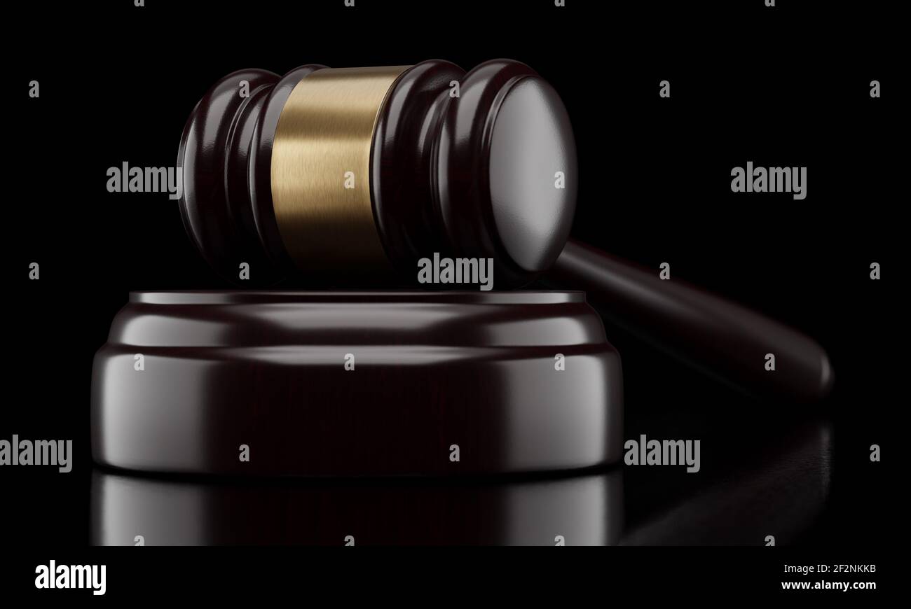 Close-up of a judge's hammer on a black background. Reflective surface ...