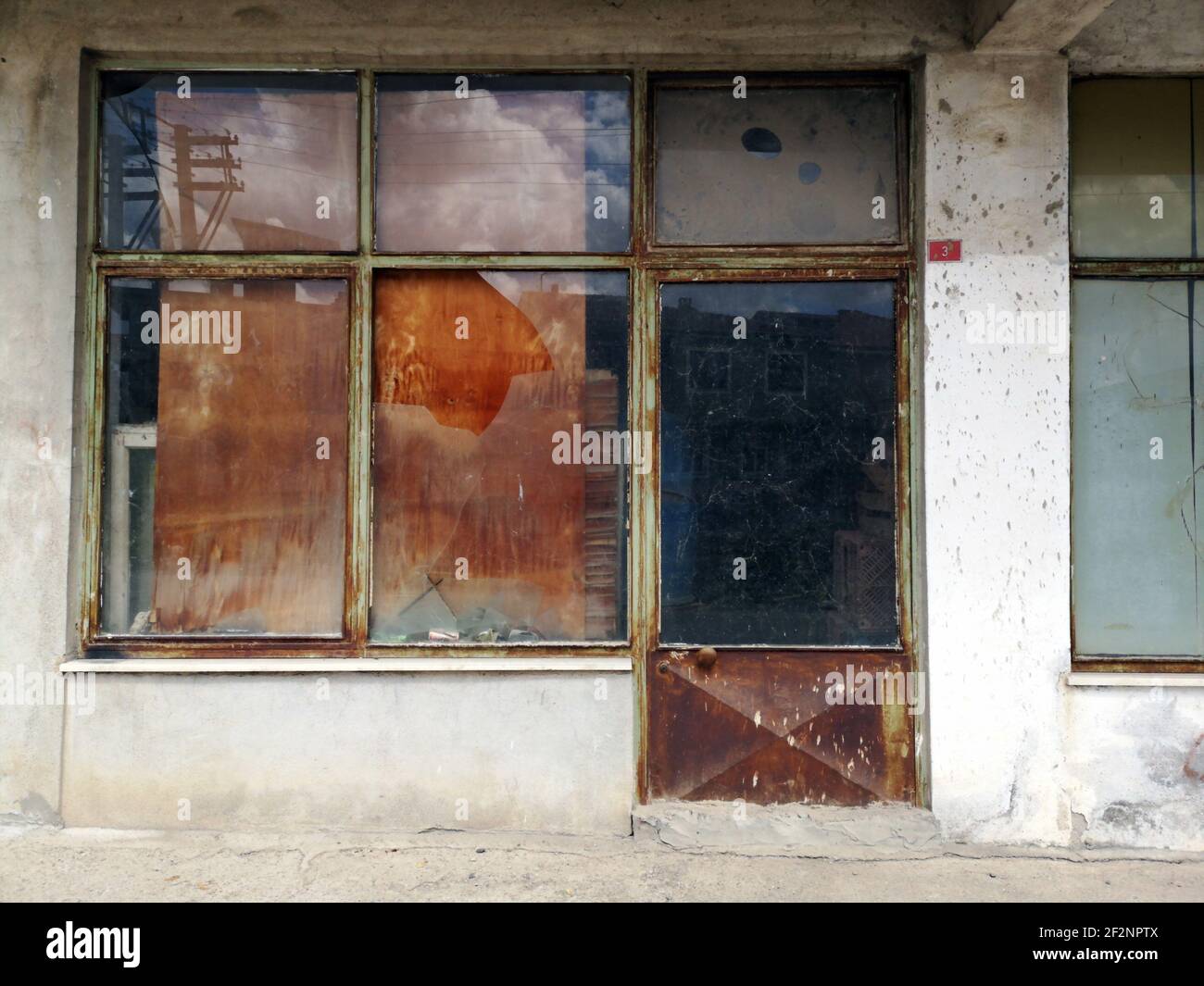 The old windows and doors with rusty frames Stock Photo - Alamy