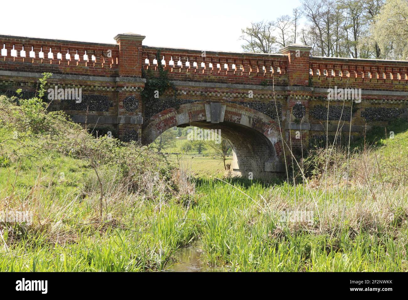 Solid brickwork of a bridge across a stream Stock Photo - Alamy