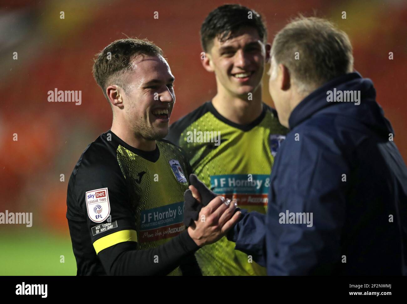 Barrow's Josh Kay (left) celebrates with Barrow coach Neil McDonald ...