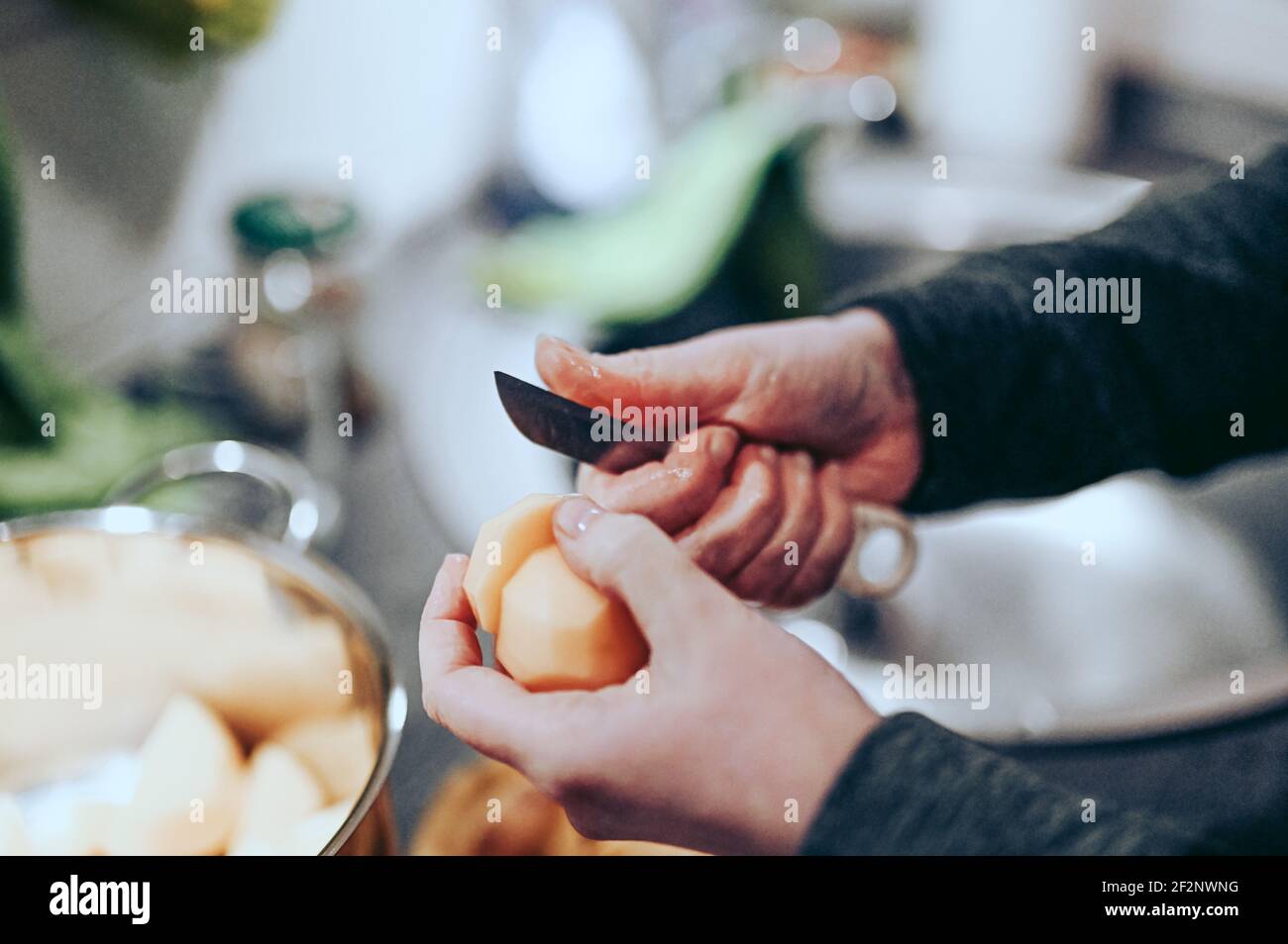 Potatoes are peeled before cooking Stock Photo - Alamy