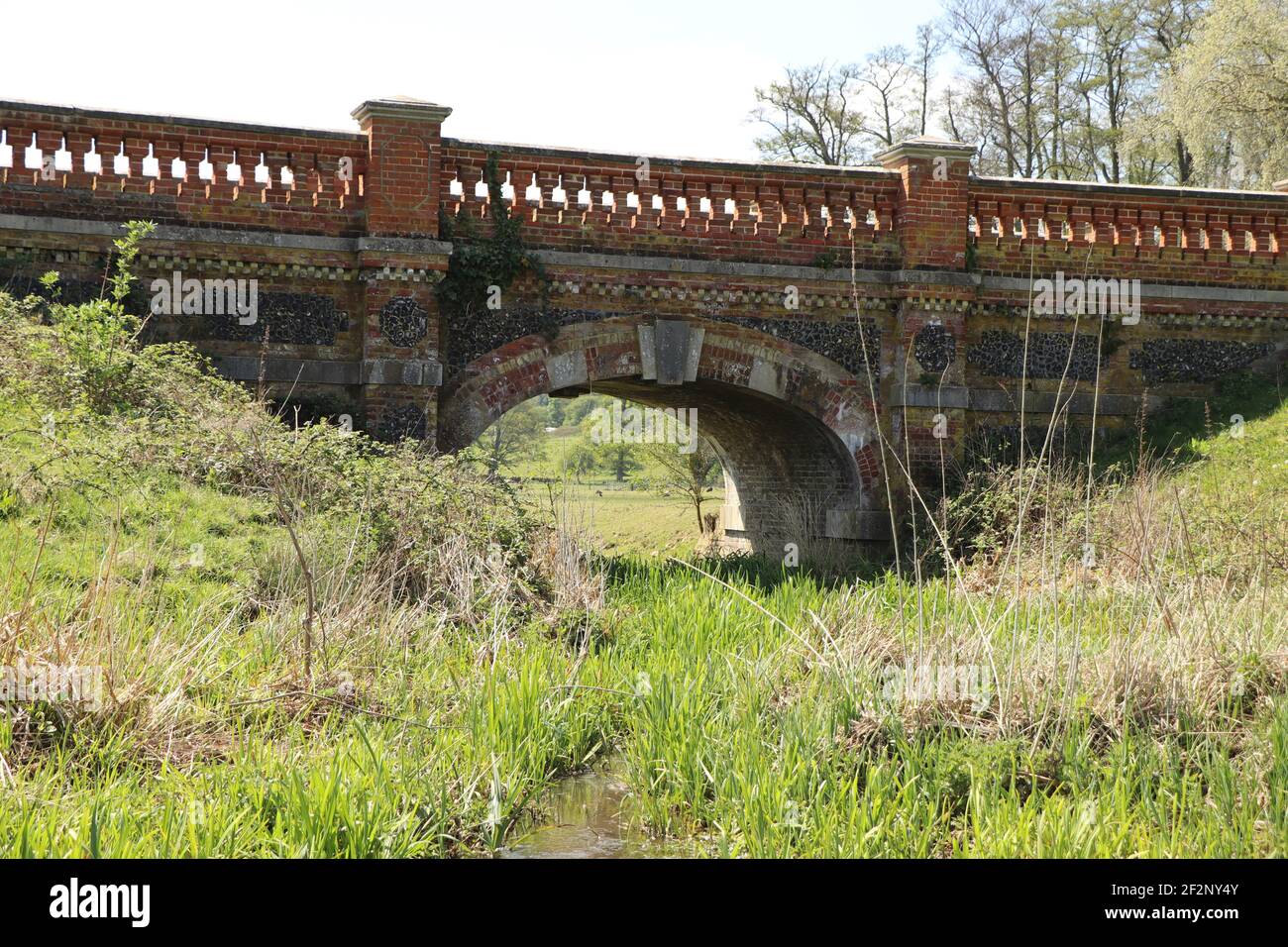 Solid brickwork of a bridge across a stream Stock Photo - Alamy