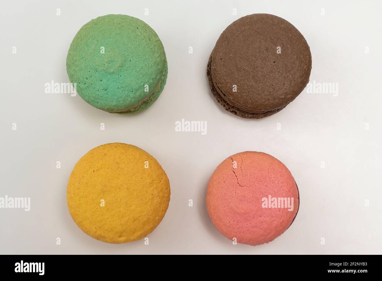Colorful french macarons on white background. Top view. Pastel colors ...