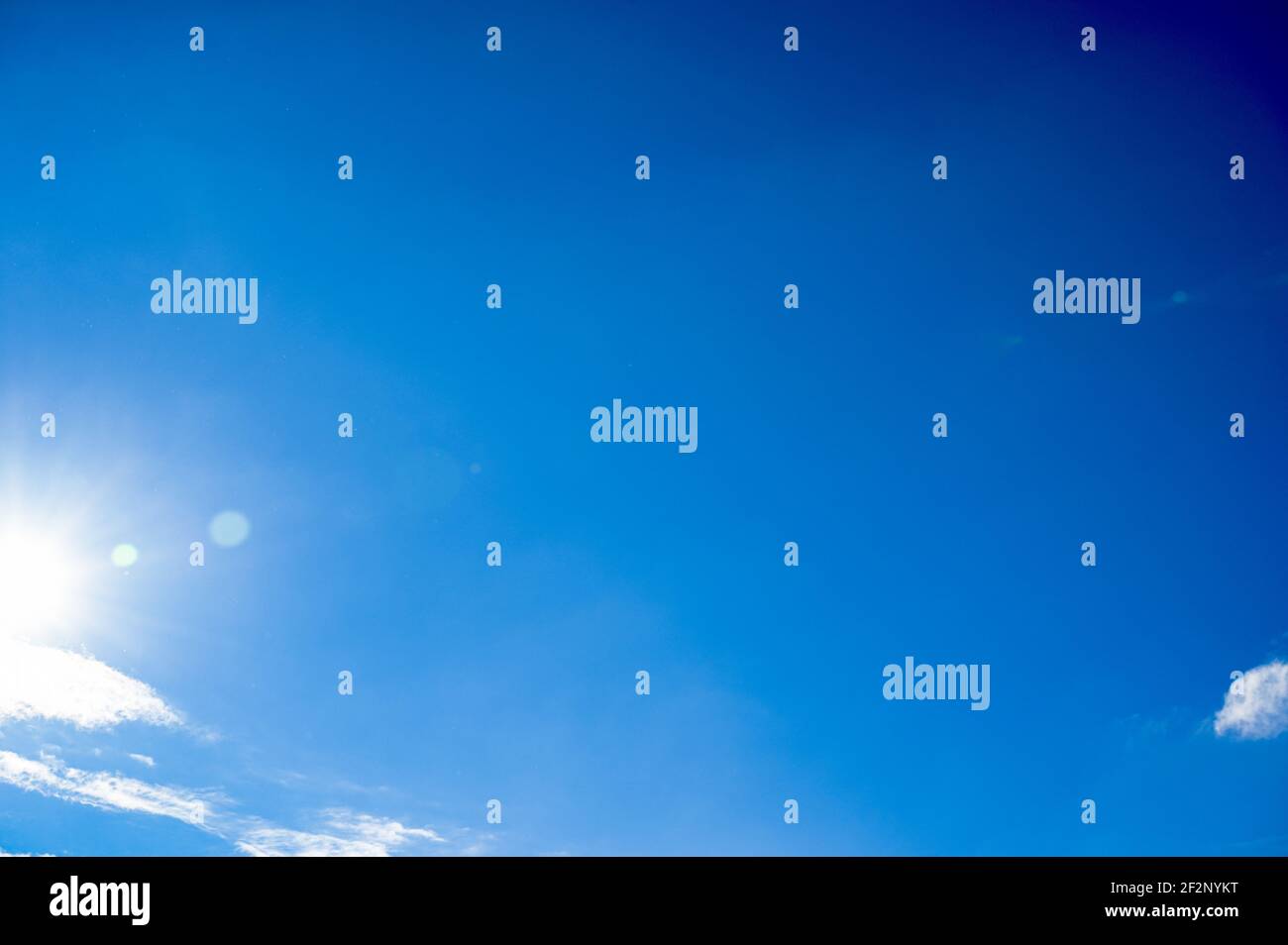 Blue sky with few clouds Stock Photo - Alamy