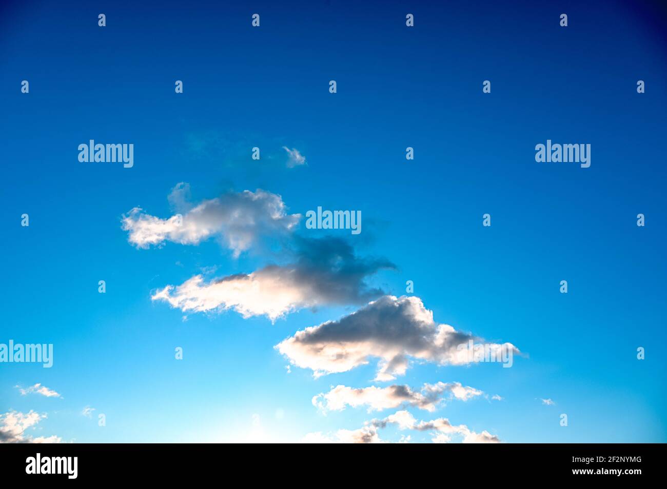 Blue sky with few clouds Stock Photo - Alamy