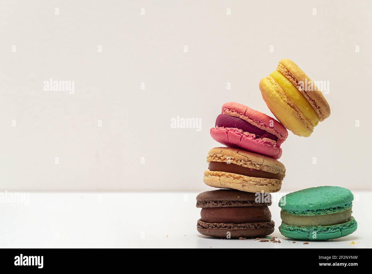 French crash macarons. Stack of macaron with dorblu and wine isolated ...