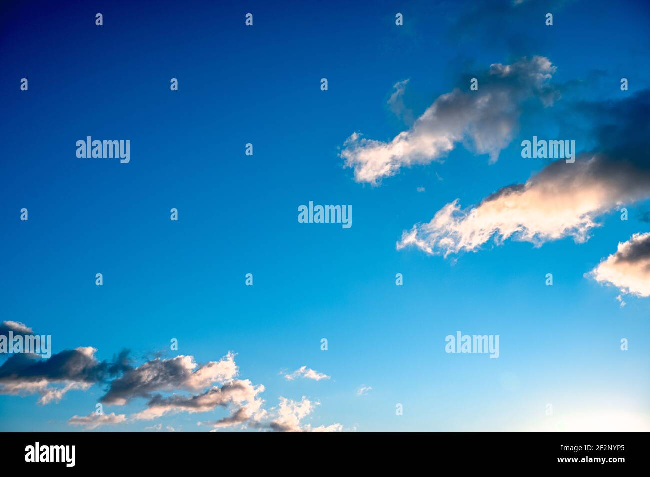 Blue sky with few clouds Stock Photo - Alamy