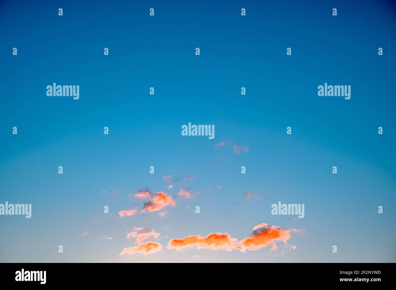 Blue sky with few clouds Stock Photo - Alamy