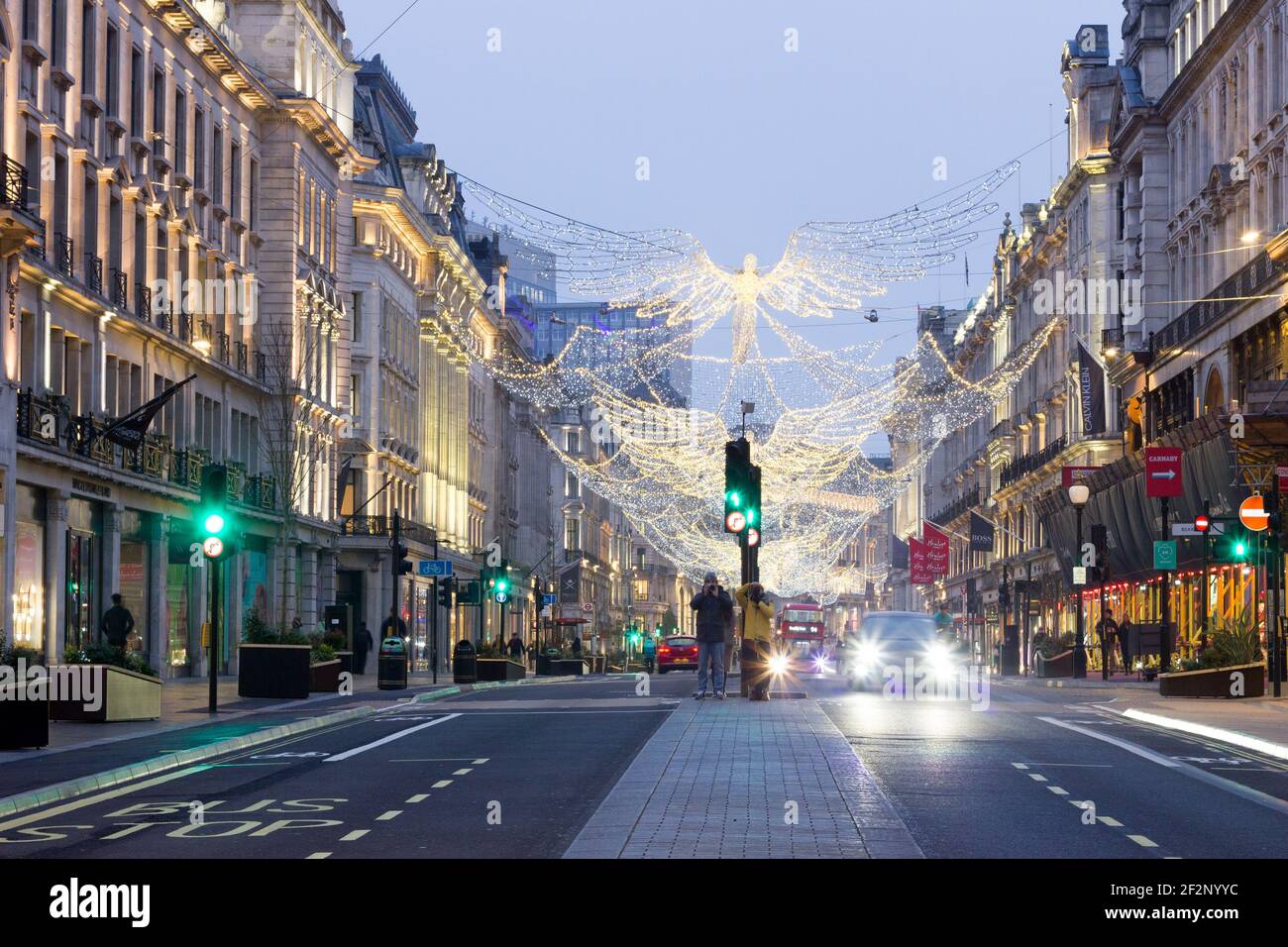 Christmas lights lit up regent street London Stock Photo - Alamy