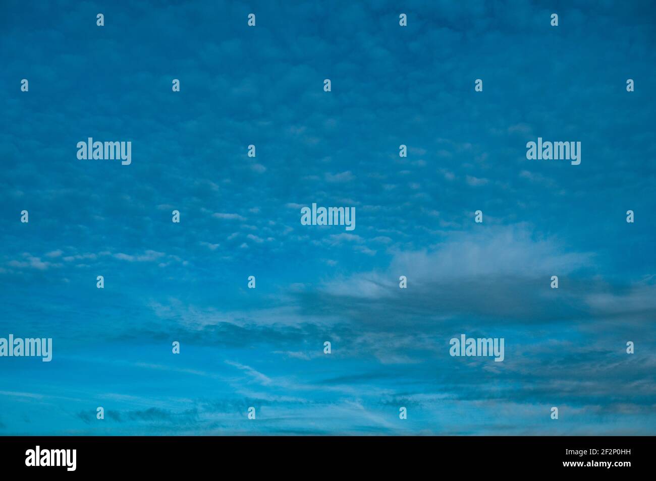 Blue sky with few clouds Stock Photo - Alamy