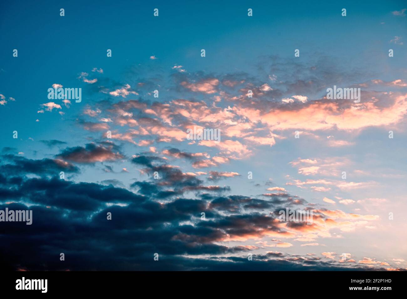 Blue sky with few clouds Stock Photo - Alamy