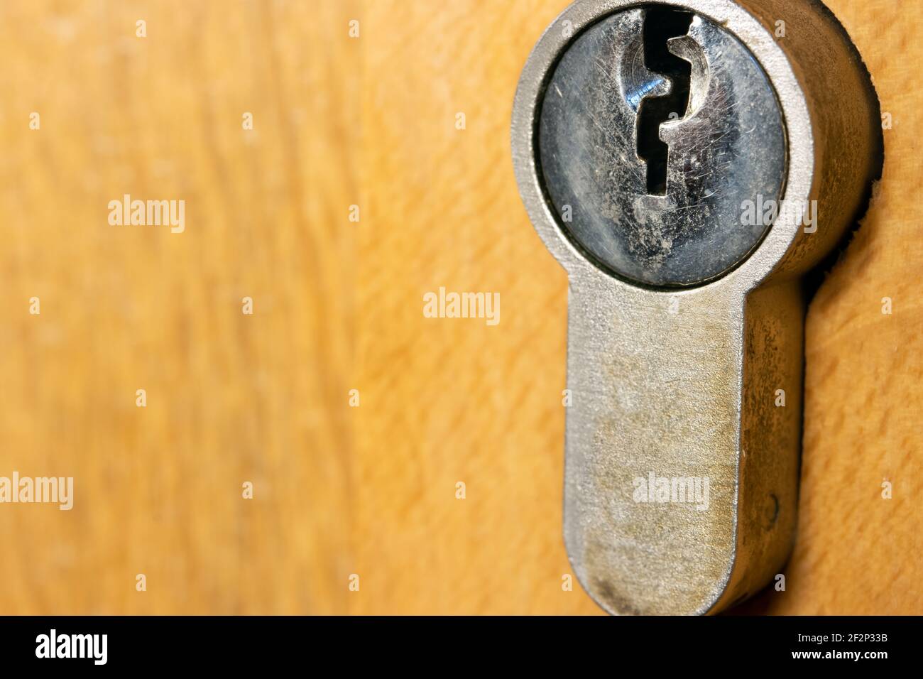 The keyhole in a wooden door lock, close up view Stock Photo - Alamy