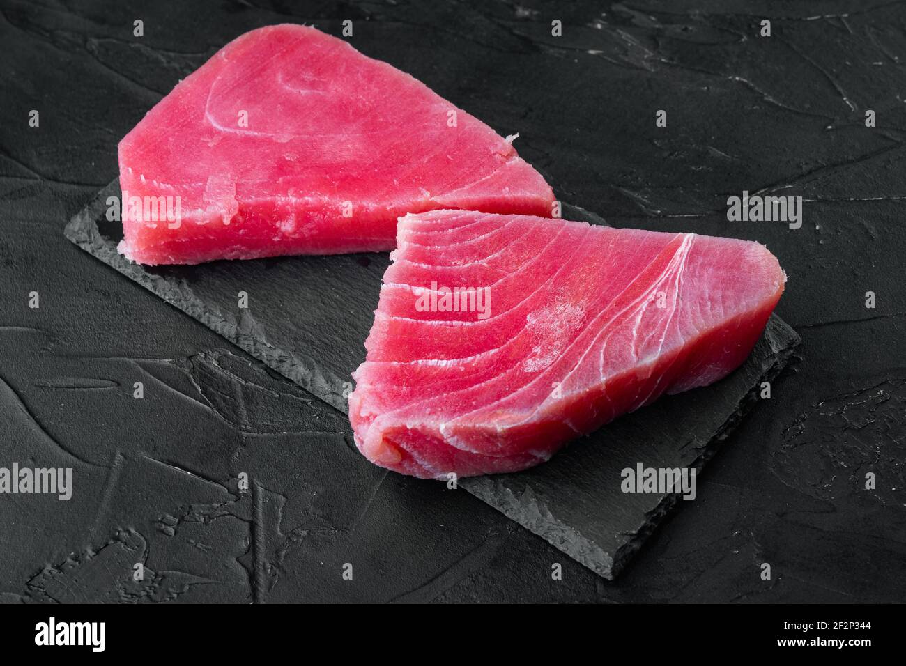 Raw tuna steak, fresh red tuna fish fillet set, on stone board, on ...
