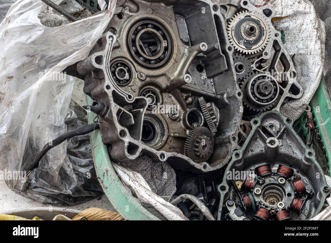 Disassembled motorcycle engine. Motorcycle powertrain parts under ...