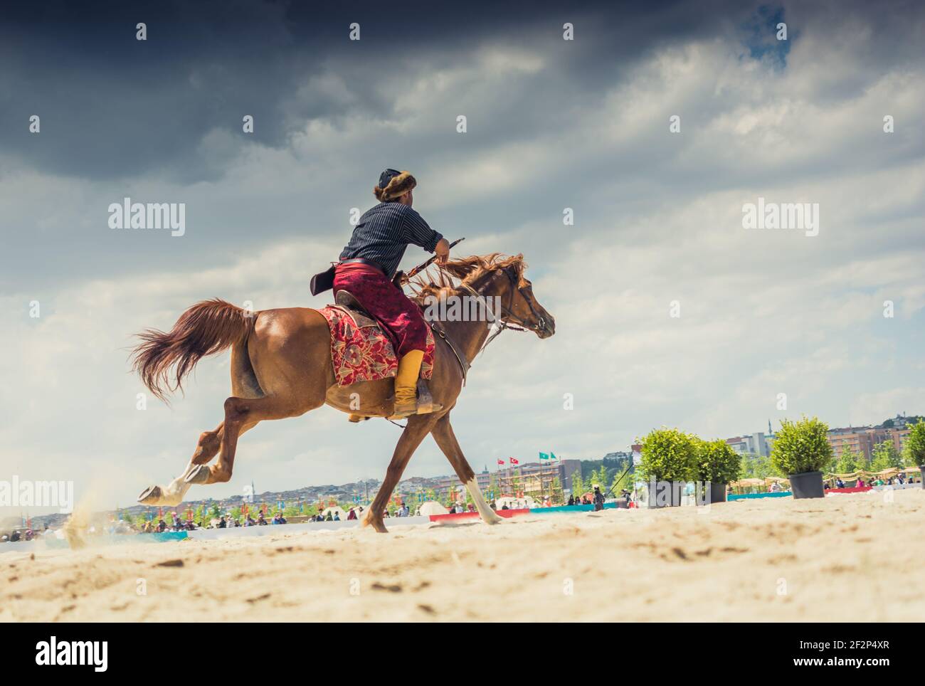 Turkish man and horseman ethnic clothes examples Stock Photo - Alamy