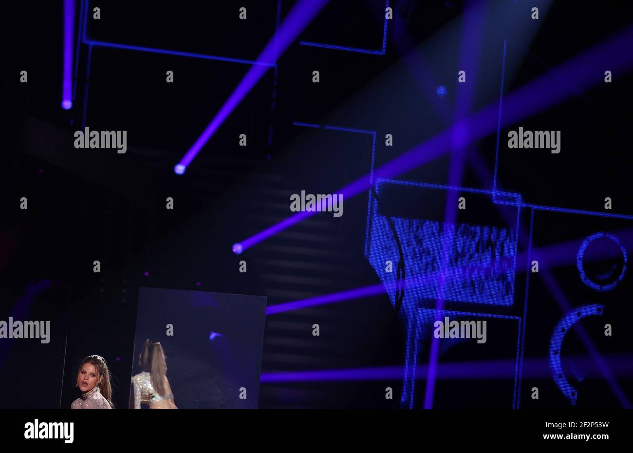 Cologne, Germany. 12th Mar, 2021. Kim Riekenberg, model, stands on ...