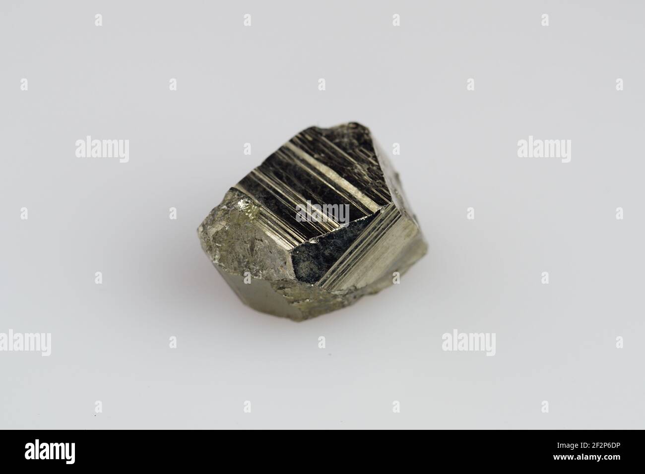 Natural pyrite on white background Stock Photo - Alamy