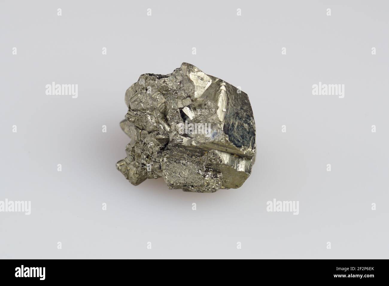 Natural pyrite on white background Stock Photo - Alamy