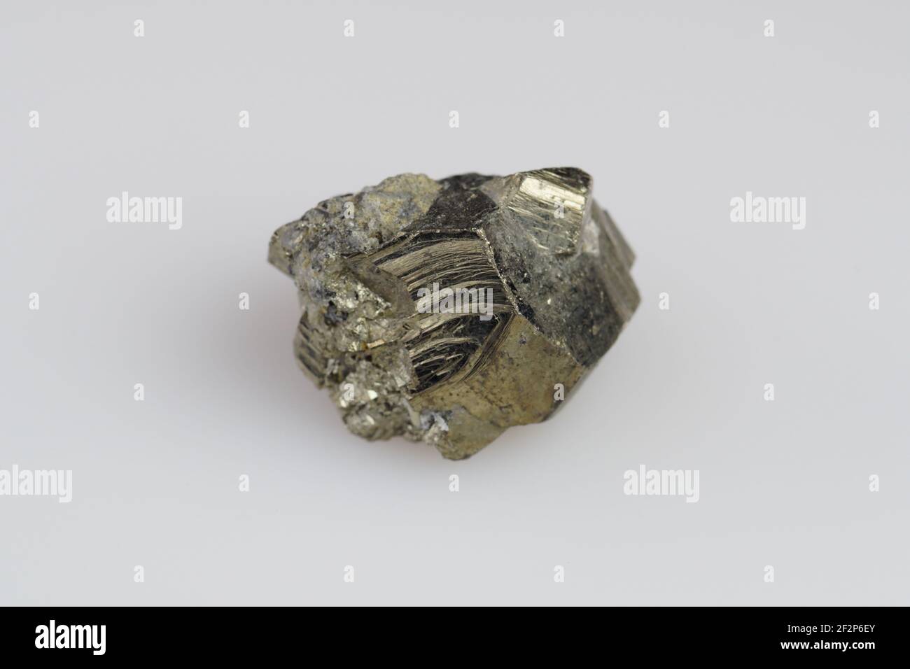 Natural pyrite on white background Stock Photo - Alamy