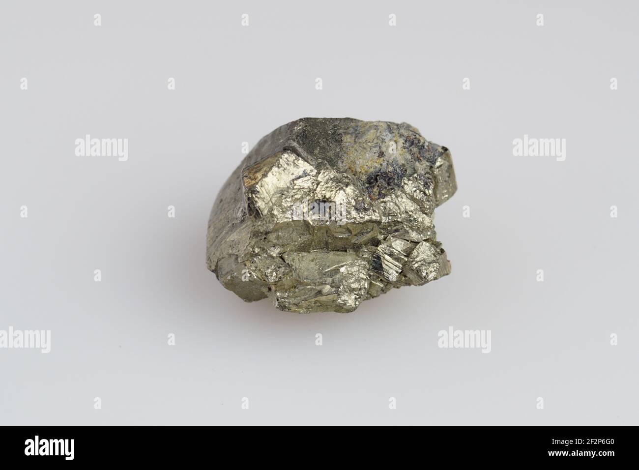 Natural pyrite on white background Stock Photo - Alamy