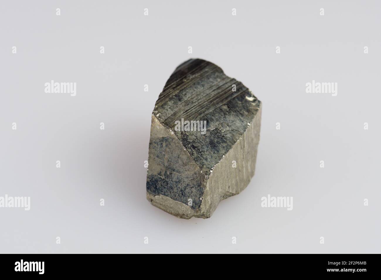 Natural pyrite on white background Stock Photo - Alamy