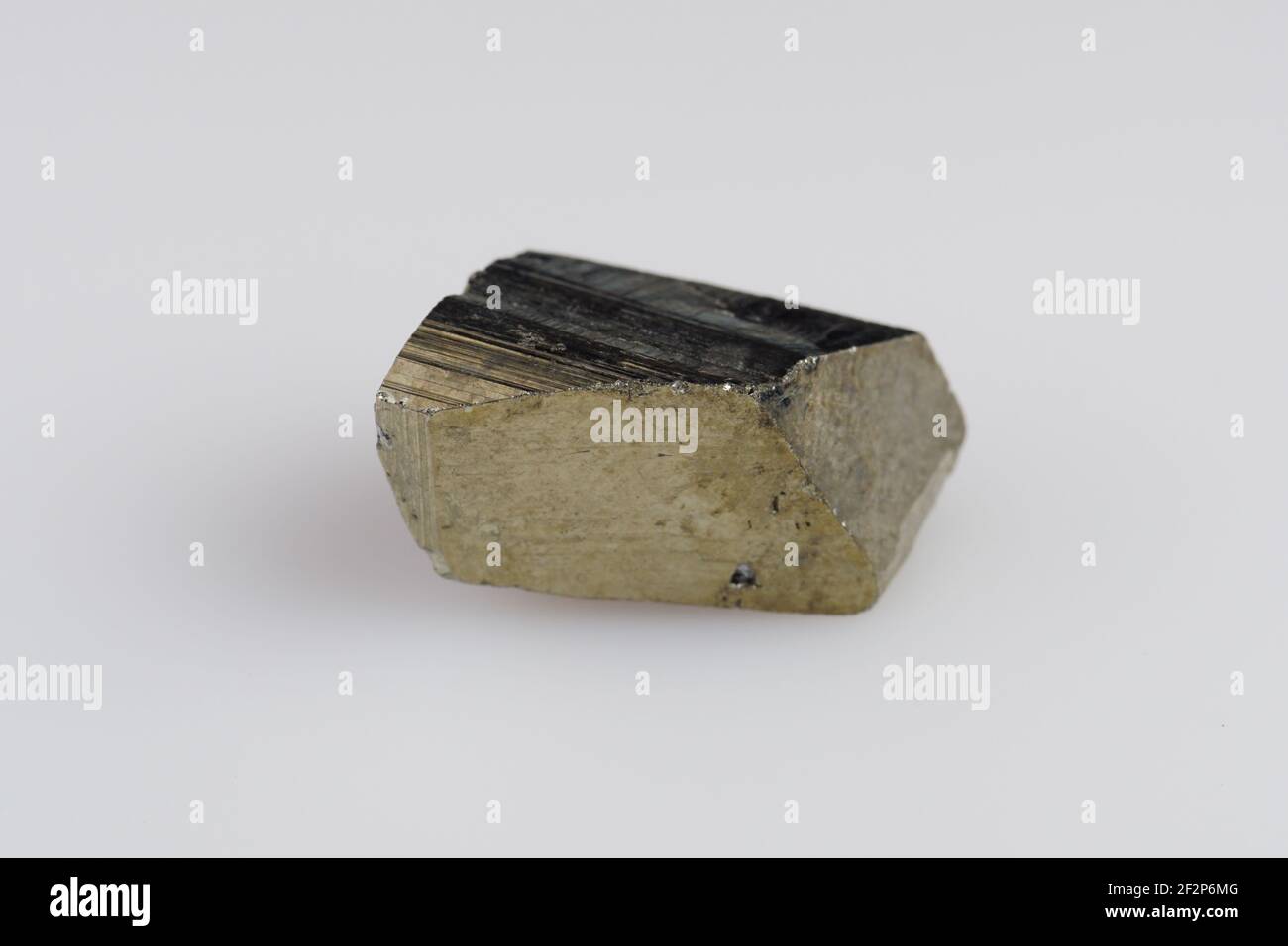 Natural pyrite on white background Stock Photo - Alamy