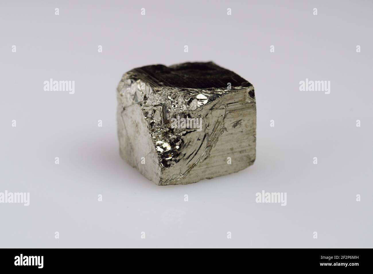 Natural pyrite on white background Stock Photo - Alamy