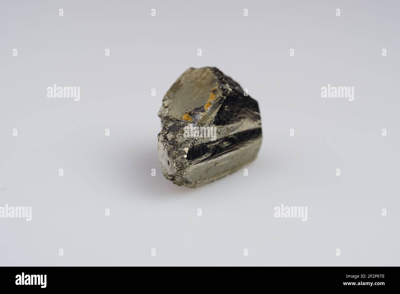 Natural pyrite on white background Stock Photo - Alamy