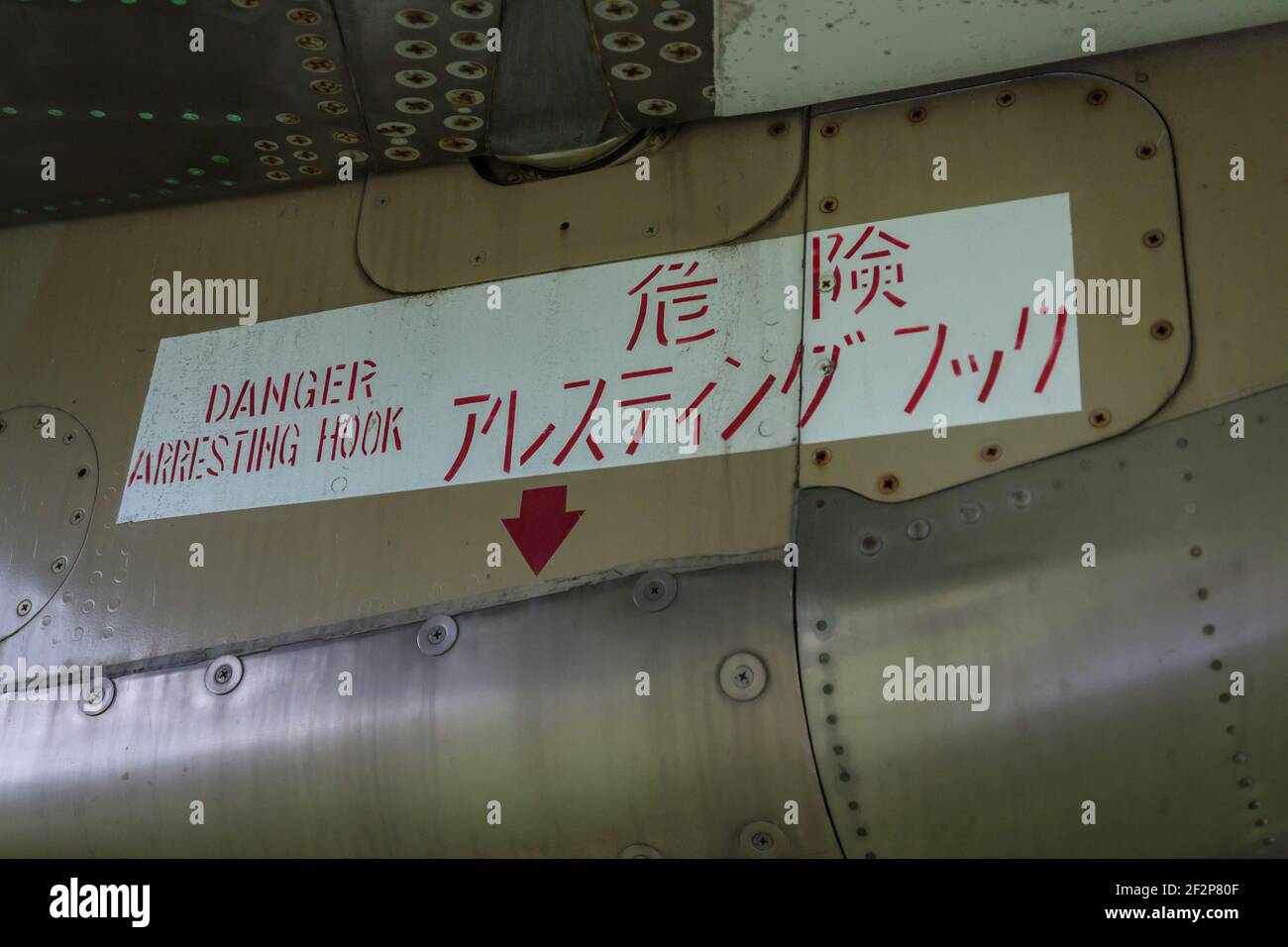 Close up detail of arrester hook warning sign on a Mitsubishi F-1 jet ...