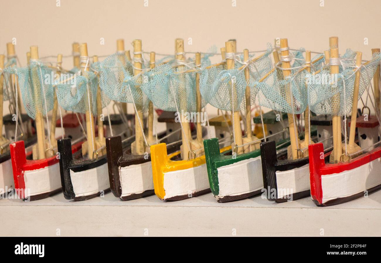 Set of small colorful wooden model boats Stock Photo - Alamy