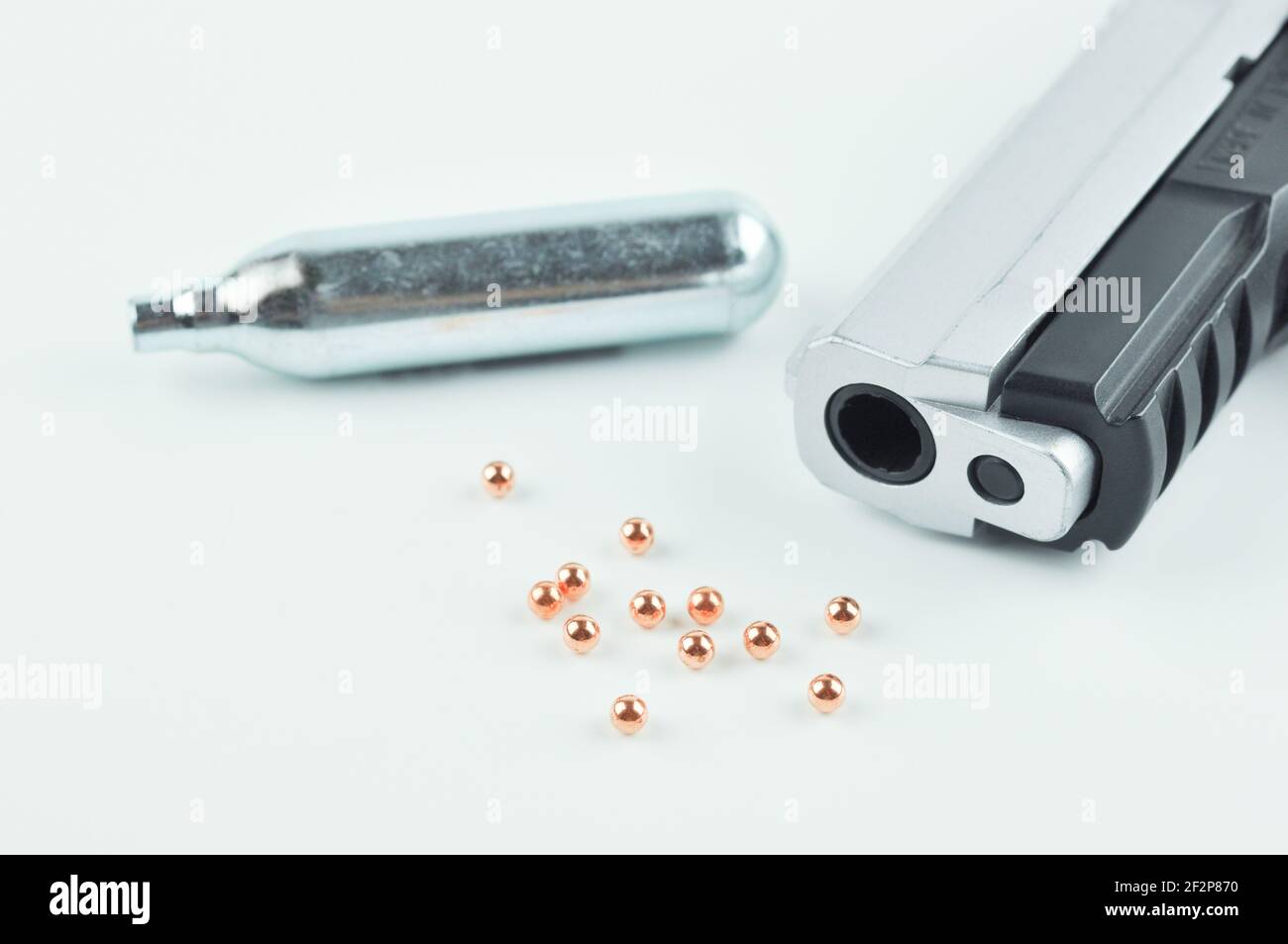 Air Gun, Co2 Cartridges and Pellets. Focus on a gun barrel Stock Photo ...