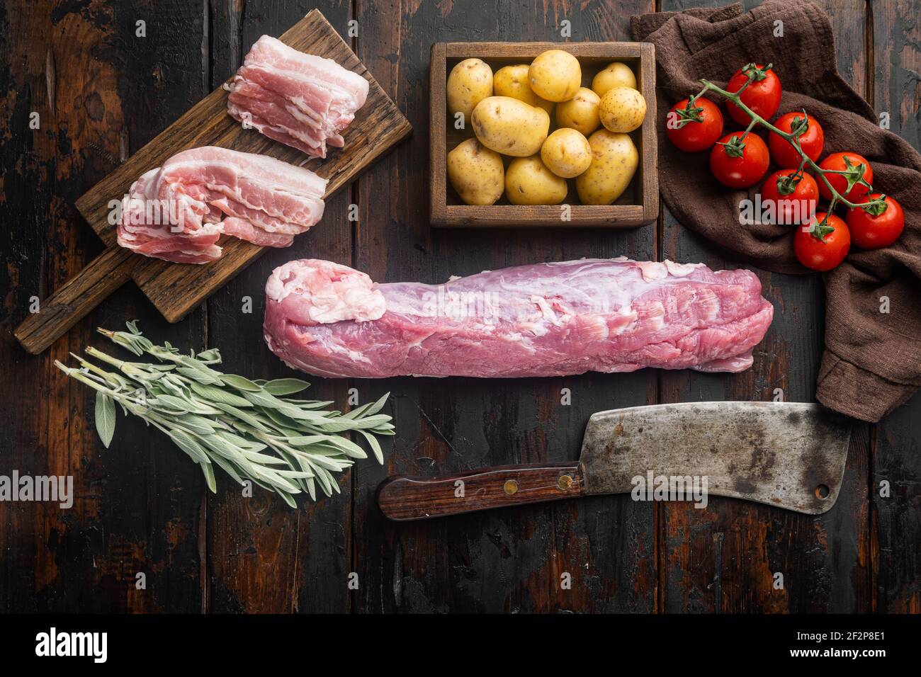 Raw Pork and mash gratin ingredients set with old butcher cleaver knife ...