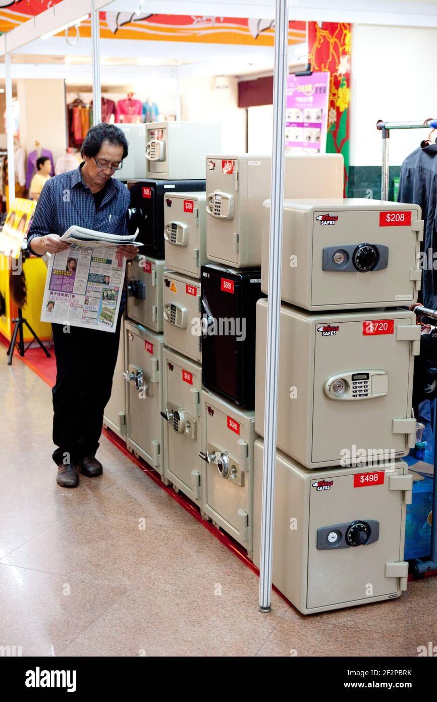 Selling safes in a mall in Chinatown Stock Photo - Alamy