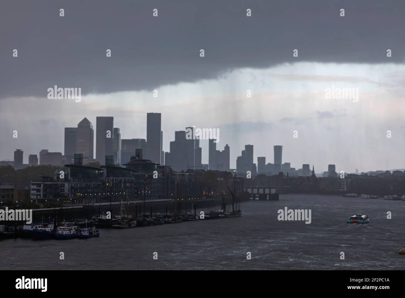 England, London, Docklands, River Thames and Canary Wharf Skyline on a ...