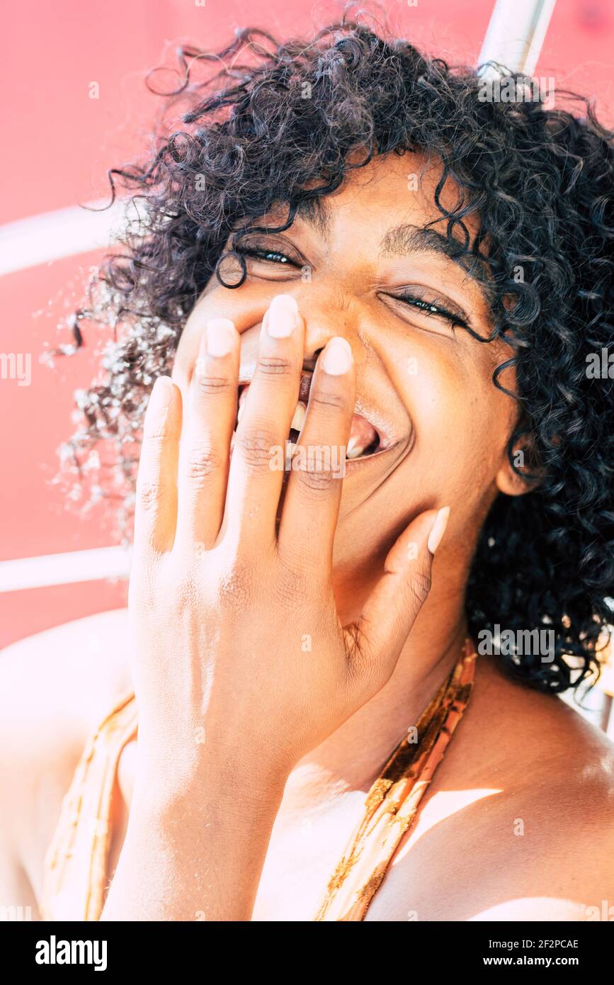 Black beautiful young woman laugh a lot in close up portrait - afro ...