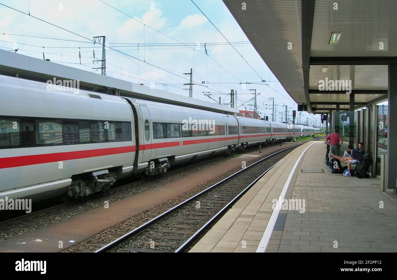Train arriving at a German train station Stock Photo - Alamy