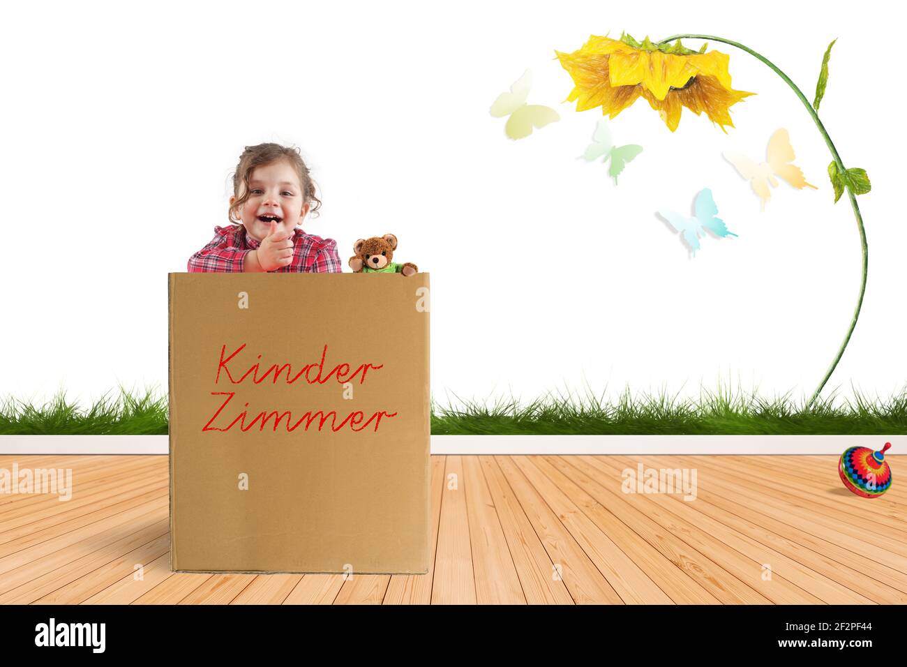 Child in a cardboard box Stock Photo - Alamy