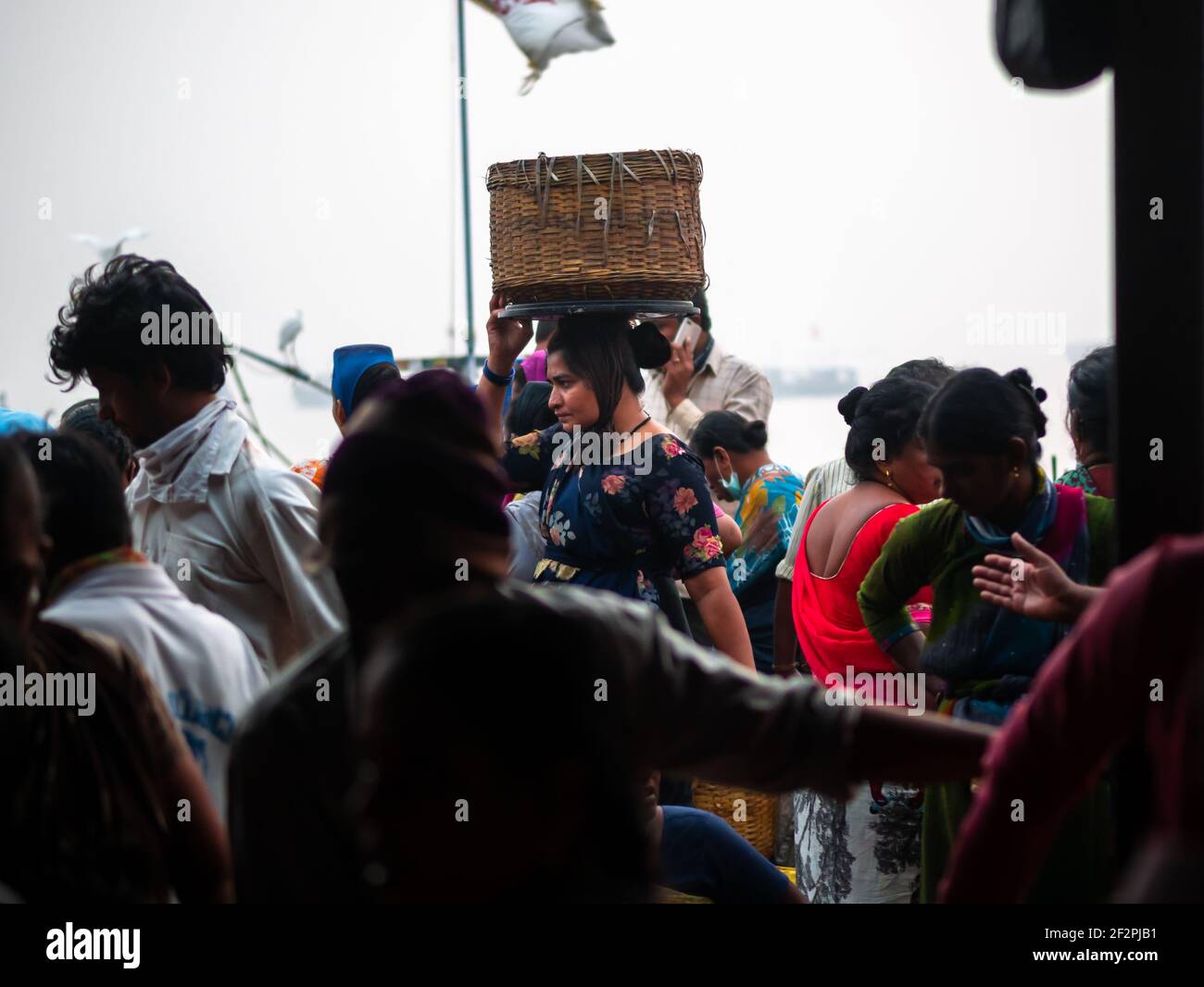 Mumbai, India - January 1, 2021 : Unidentified Women and men trade in a ...