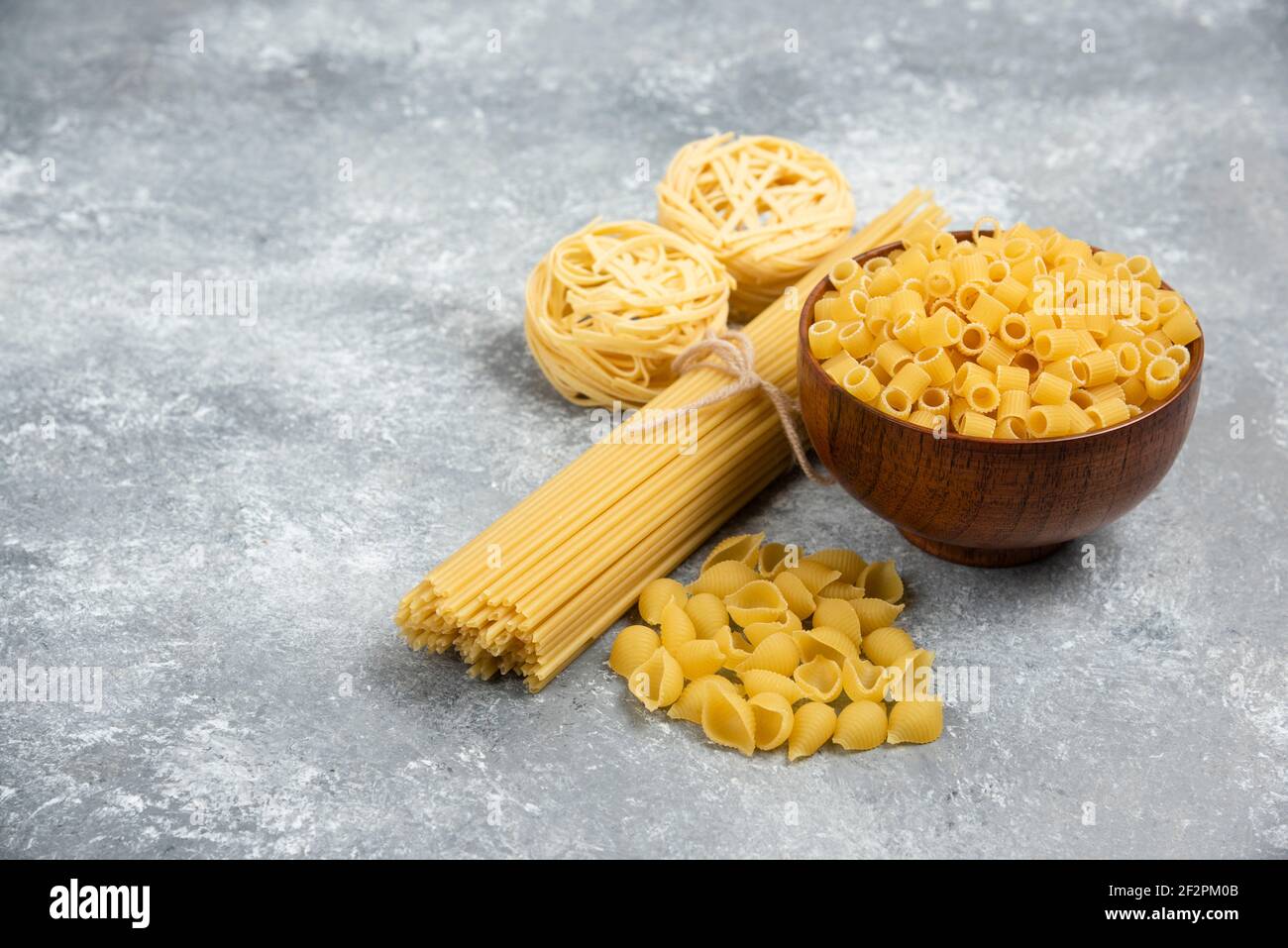 Raw pasta and spaghetti varieties on marble background Stock Photo - Alamy