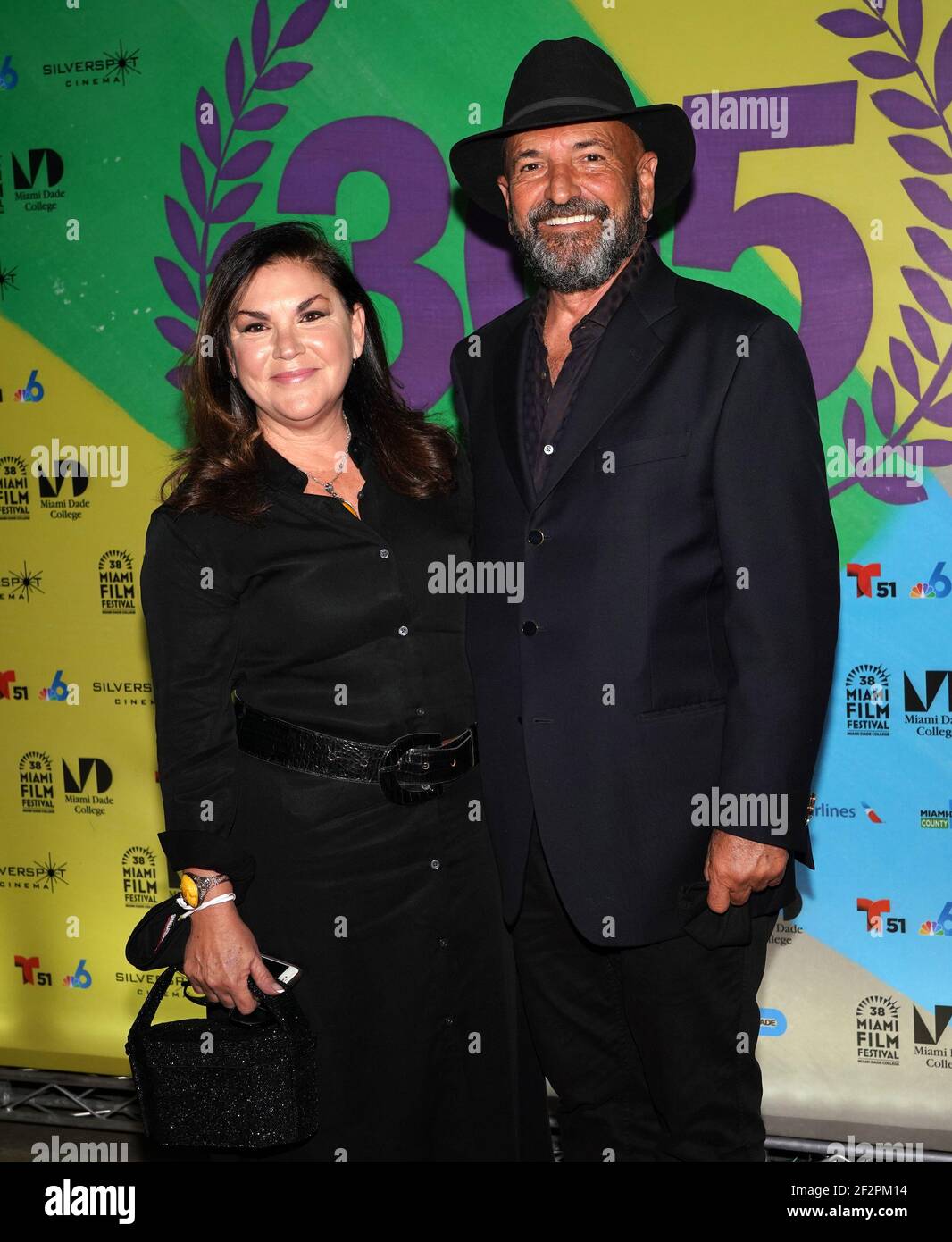 MIAMI, FL - MARCH 12: Actor Gilberto Reyes (R) and wife attend the premier of the movie ...