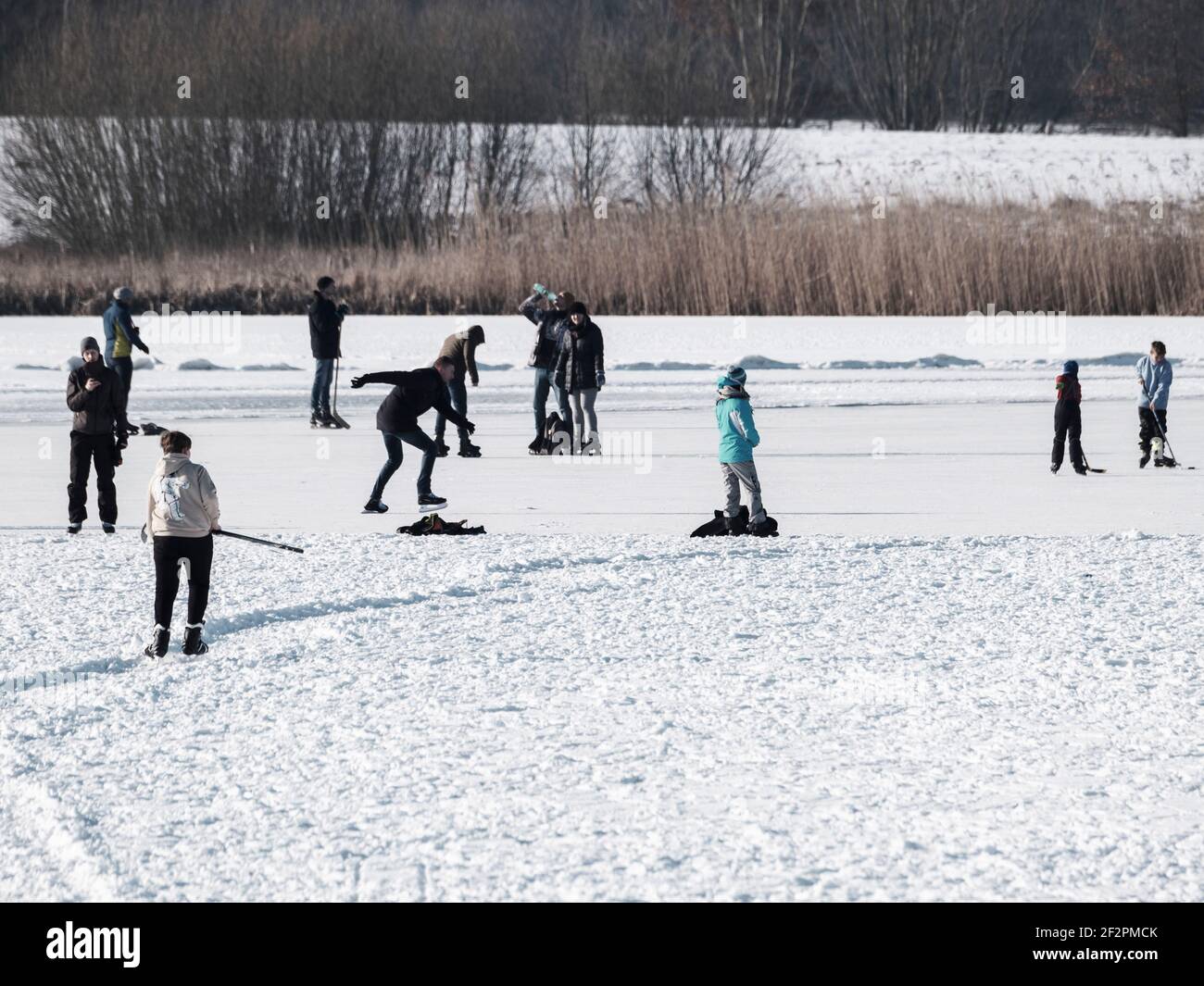 Ice fun on a frozen lake Stock Photo - Alamy