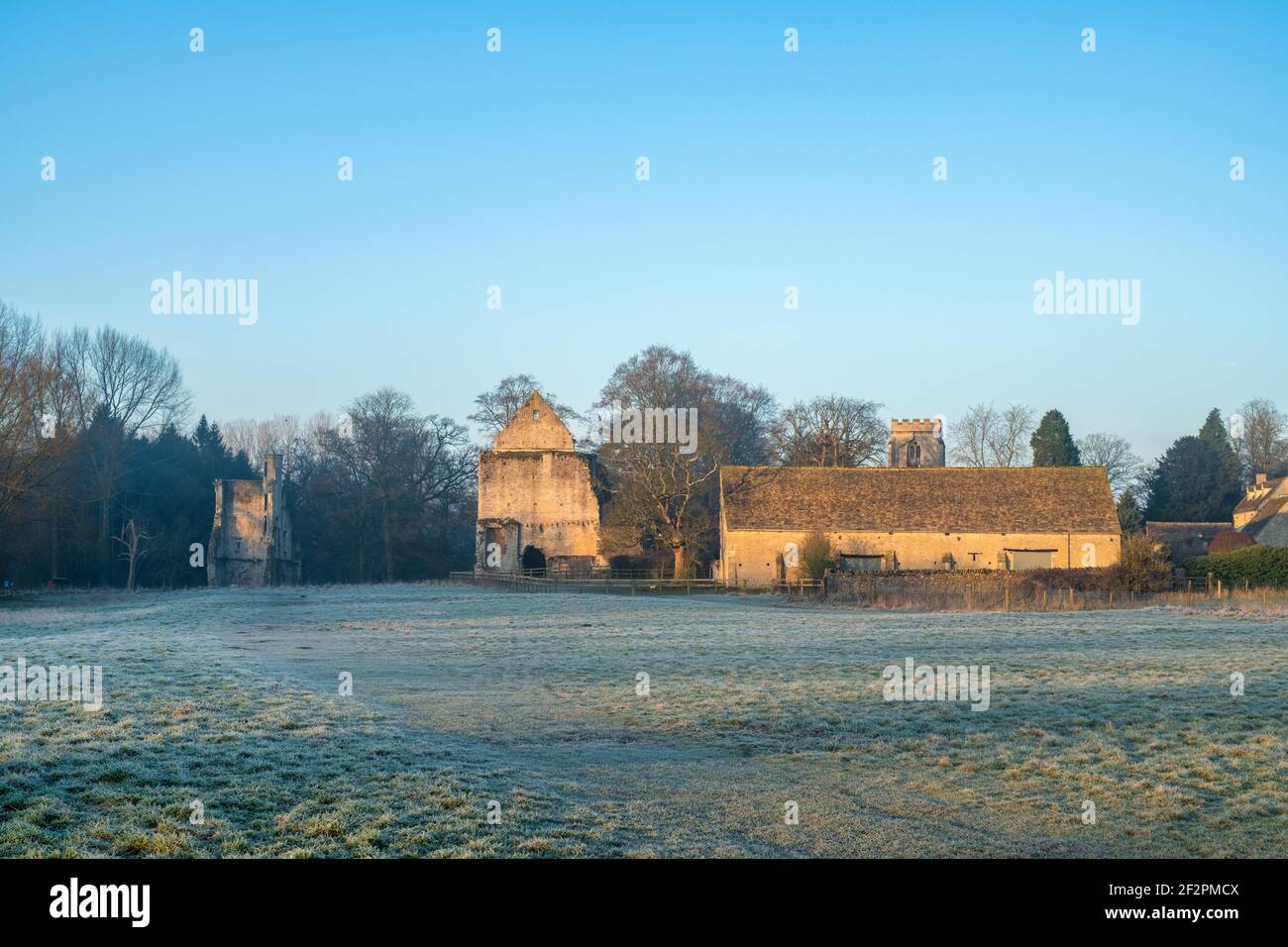 Minster Lovell Hall and village in the mist and frost at sunrise ...