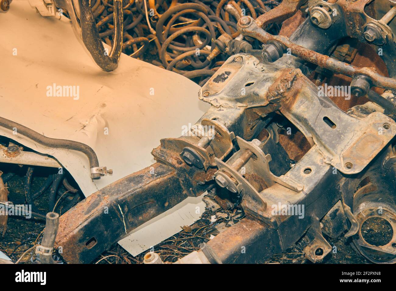 Old Car Chassis and Coil Spring and Ball Joint Set and Hose on Ground ...